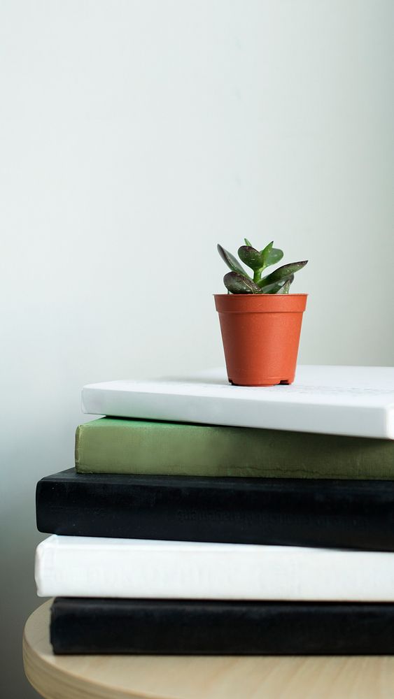 Stacked books iPhone wallpaper, reading | Premium Photo - rawpixel