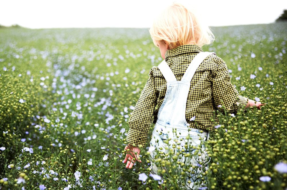 Little boy in a flower | Free Photo - rawpixel