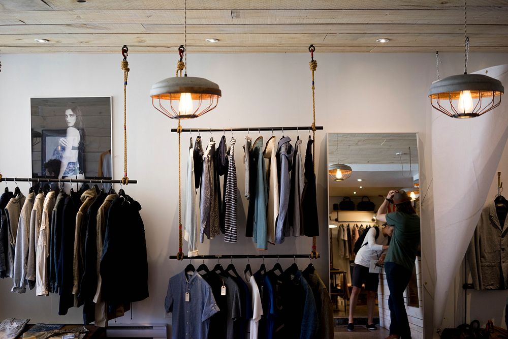 Racks with men's apparel on the walls | Free Photo - rawpixel