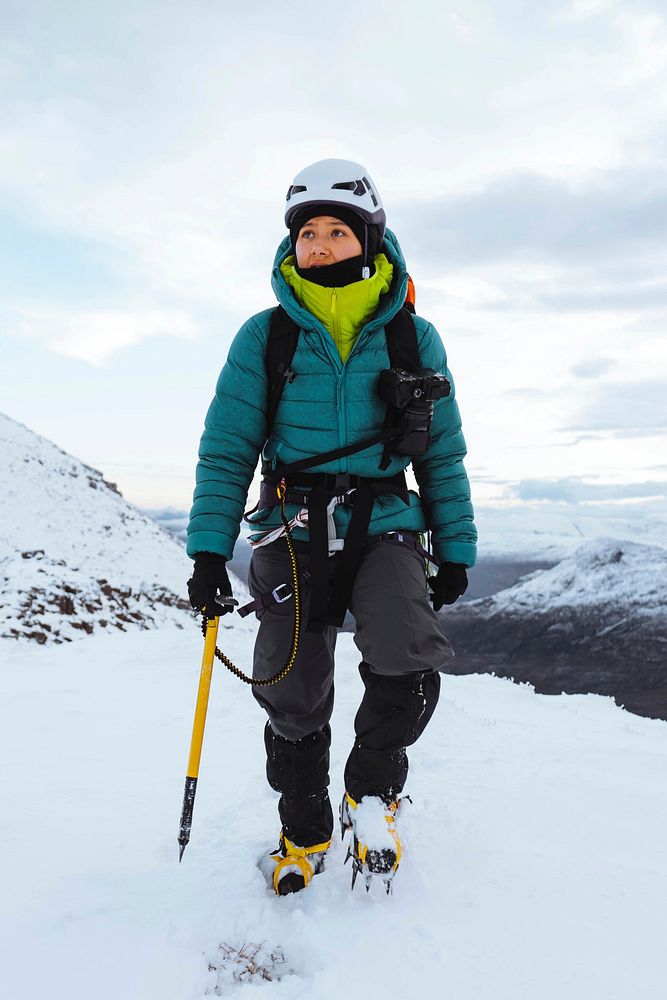 Mountaineer climbing in the snow | Premium Photo - rawpixel
