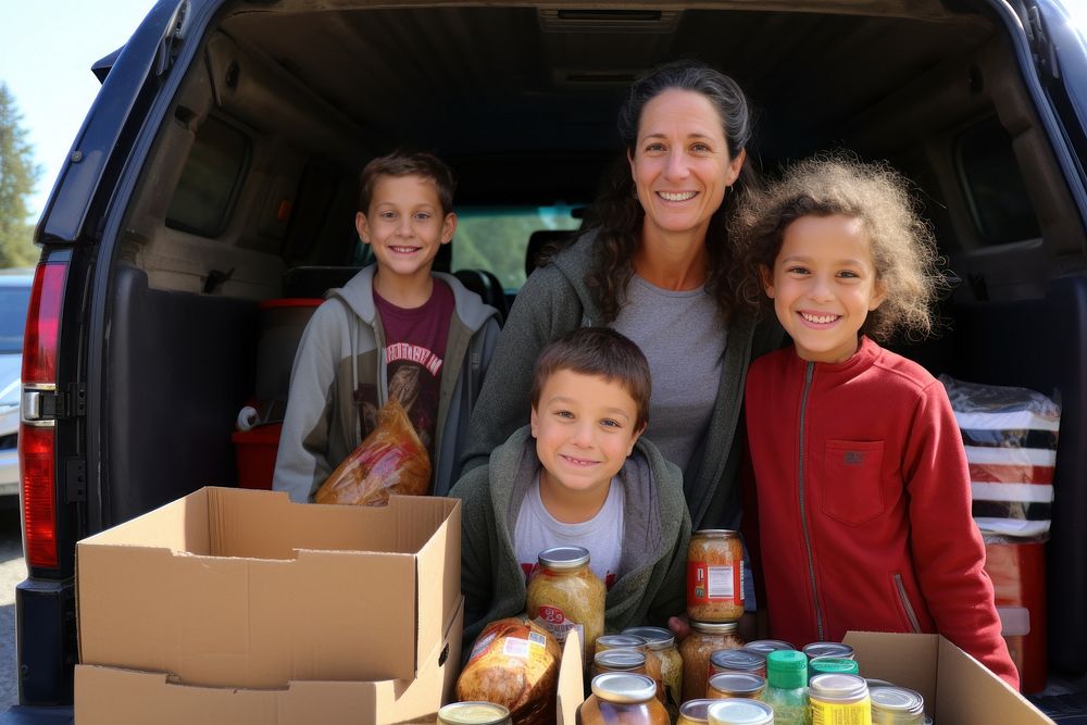 Family volunteering at food bank | Free Photo - rawpixel
