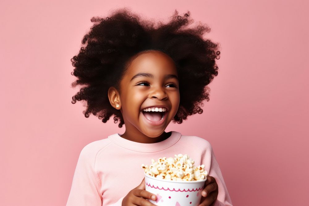 Laughing popcorn child smile. AI | Free Photo - rawpixel