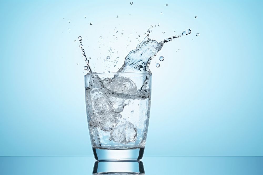 Glass splashing drink water. AI | Free Photo - rawpixel