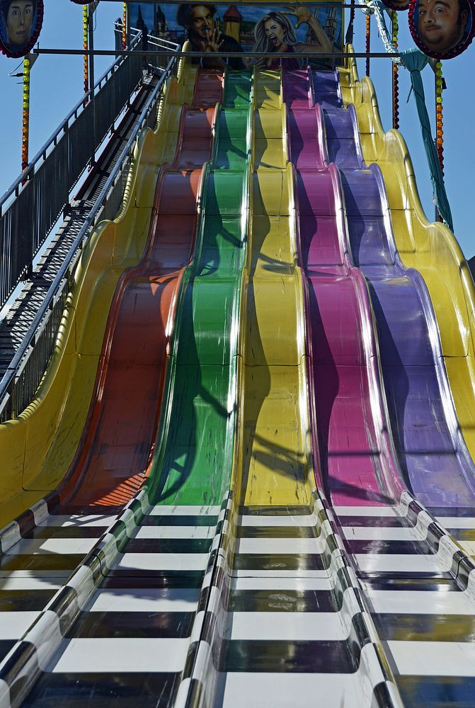 Colorful slides at amusement park. | Free Photo - rawpixel