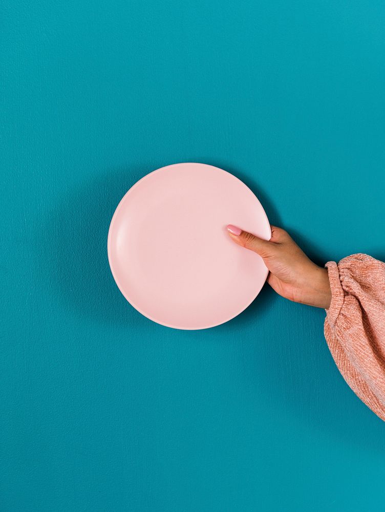 Closeup of hand holding pink | Premium Photo - rawpixel