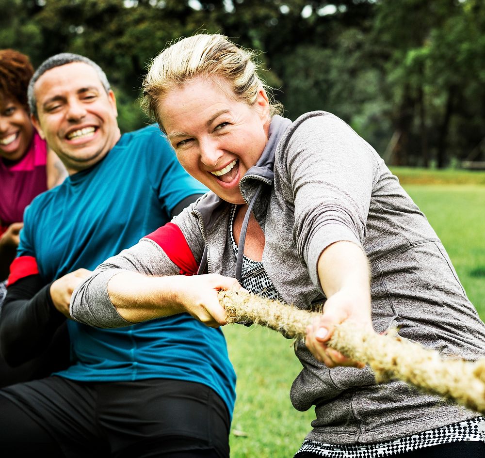 Team competing in tug of war | Premium Photo - rawpixel