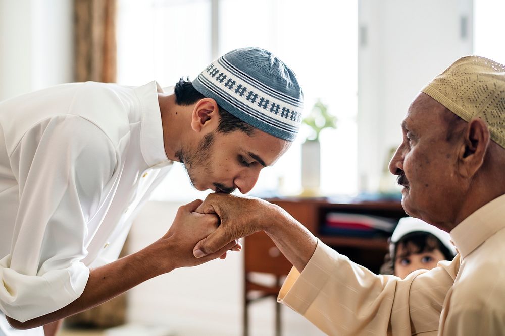 Young Muslim man showing respect | Premium Photo - rawpixel