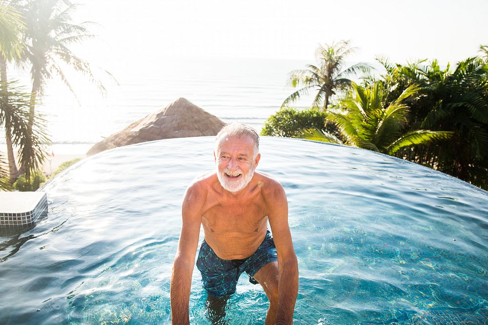 Mature man in a swimming | Premium Photo - rawpixel