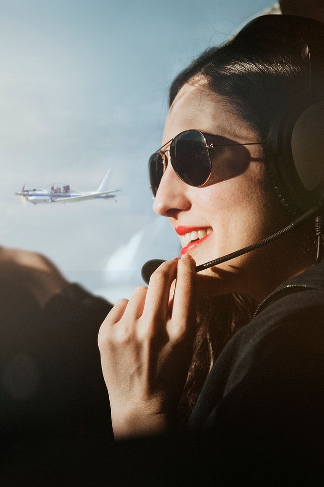 Aviator with headphones listening to the air | Premium Photo - rawpixel