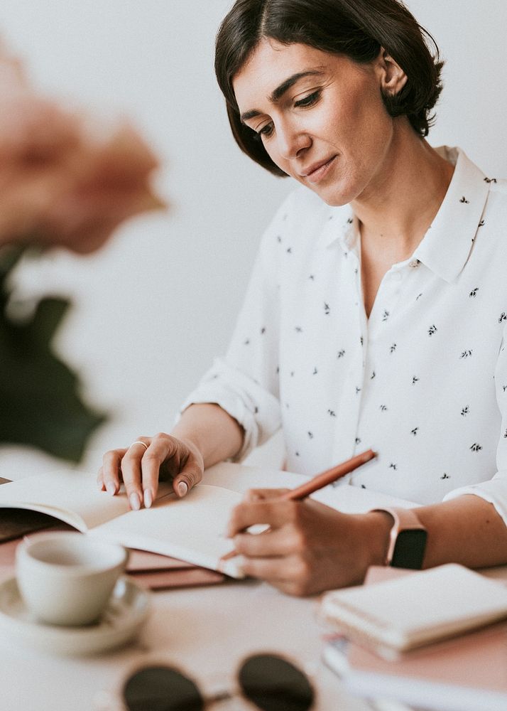Young woman writing a journal | Premium Photo - rawpixel