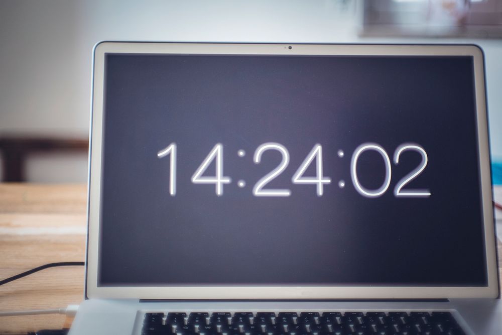 The time on a laptop | Free Photo - rawpixel