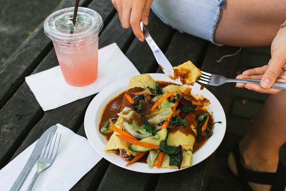 Eating enchiladas | Free Photo - rawpixel
