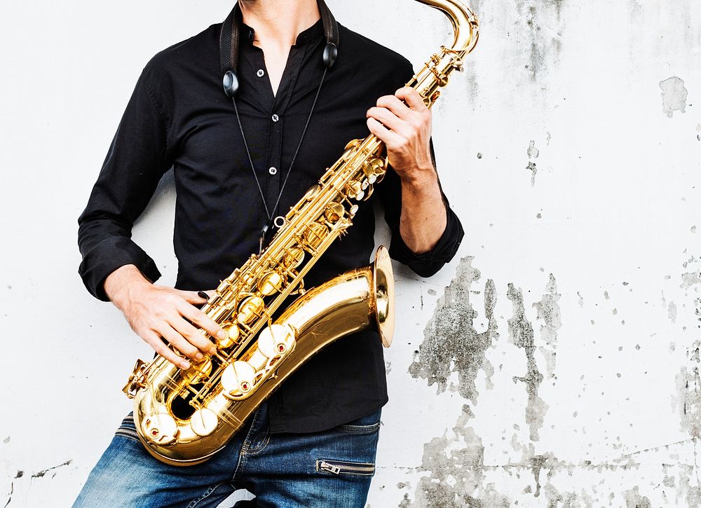 A musician with his saxophone | Premium Photo - rawpixel