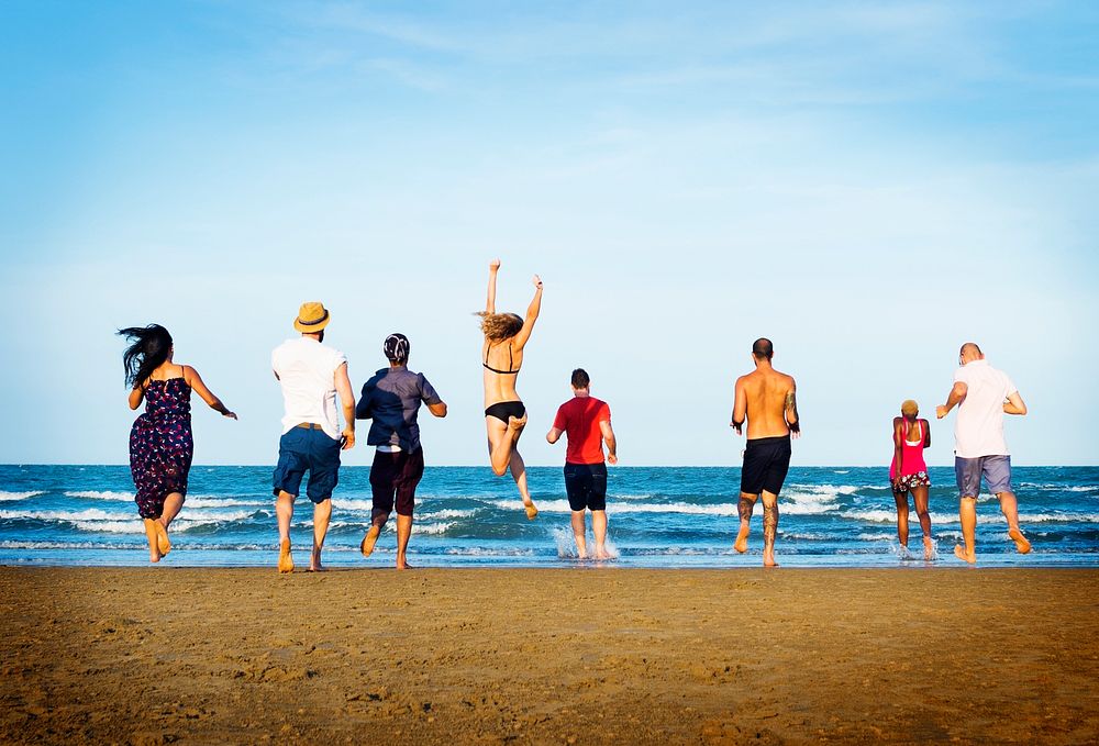 Group of diverse friends at a beach | Premium Photo - rawpixel