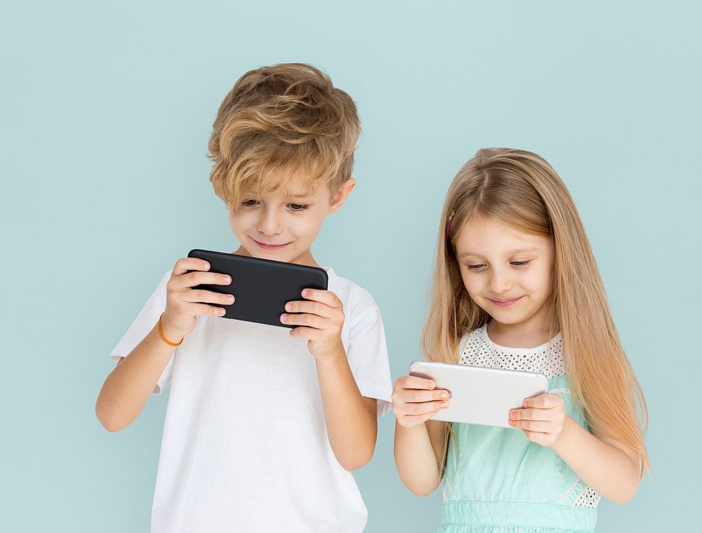 Young Kids Playing Mobile Phone | Free Photo - rawpixel