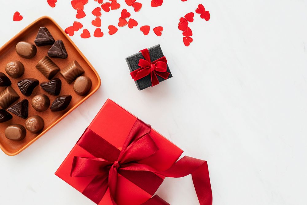Chocolates by a box of red | Premium Photo - rawpixel