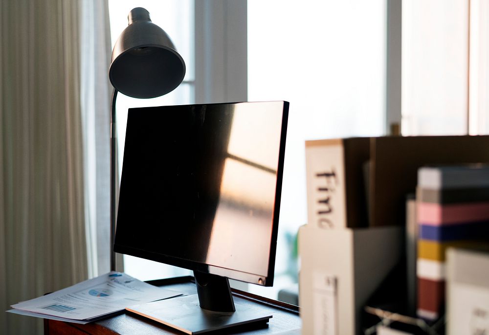 Computer monitor on wooden table | Free Photo - rawpixel