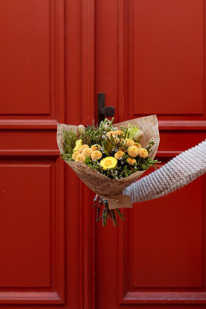 Hand holding a bouquet of assorted | Premium Photo - rawpixel