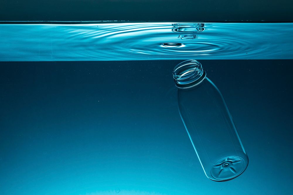 Bottle floating in the ocean | Free Photo - rawpixel