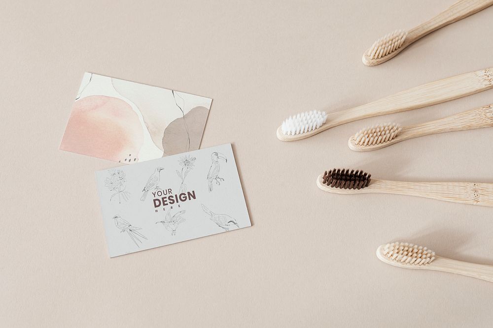 Bamboo toothbrushes and design card | Premium PSD Mockup - rawpixel