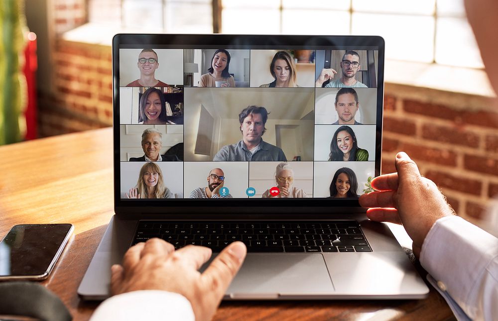Colleagues having a video conference | Free Photo - rawpixel