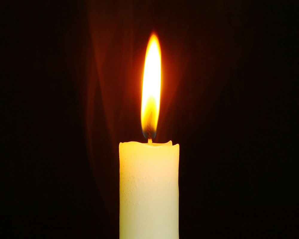 A wax candle has the luminous | Free Photo - rawpixel