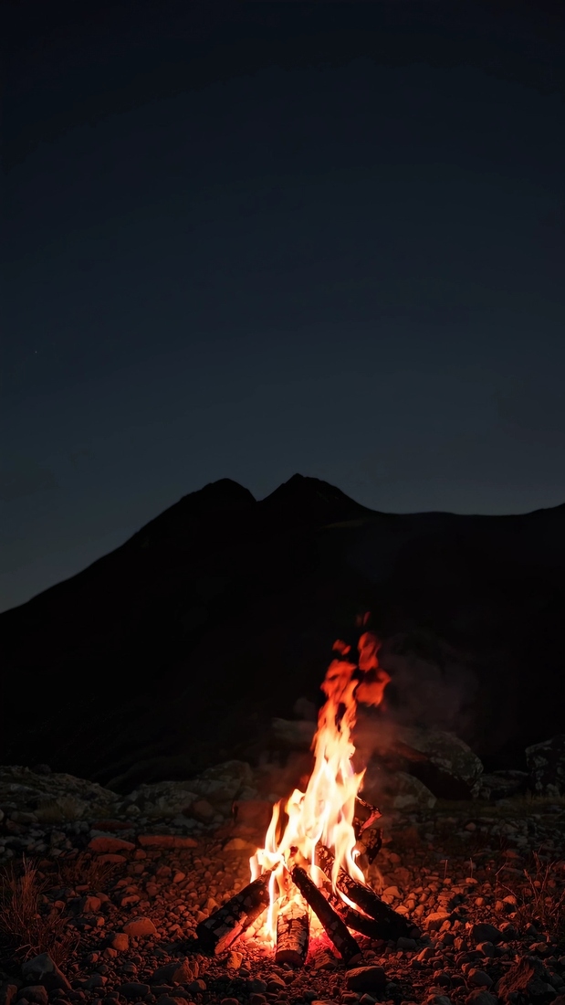 mesmerizing campfire night mountains silhouetted | Free Video - rawpixel