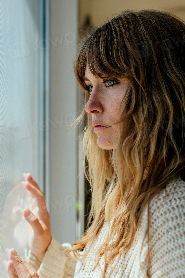 Sad woman staring window lockdown | Free Photo - rawpixel
