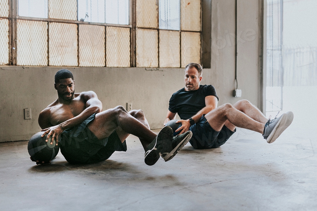 Sportive men working fitness balls | Premium Photo - rawpixel