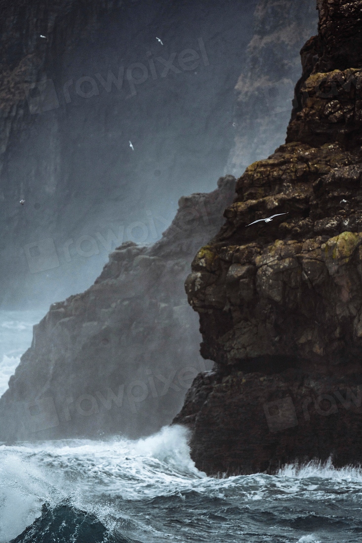 Stormy waves hitting cliffs Molin | Free Photo - rawpixel