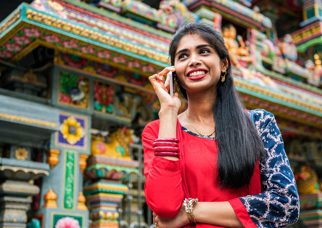 Indian woman using mobile phone | Premium Photo - rawpixel