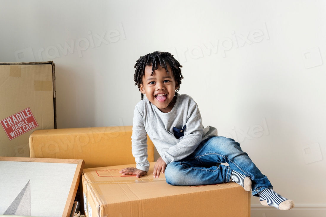 Young cheerful black boy moving | Free Photo - rawpixel