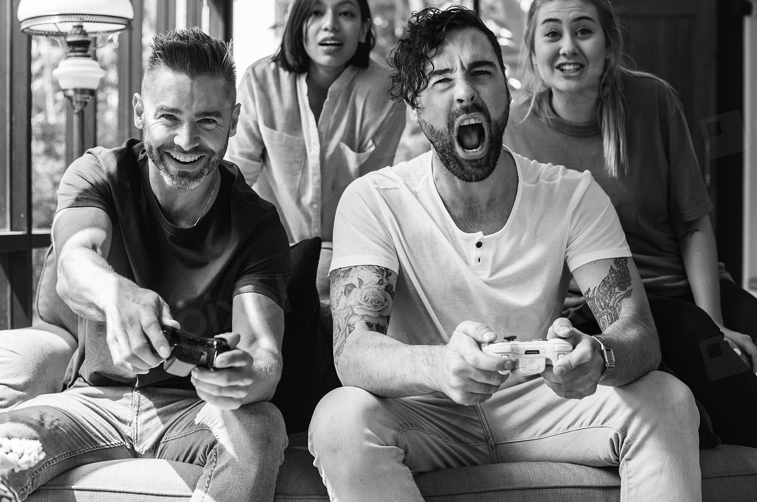 Friends enjoying video game together | Free Photo - rawpixel
