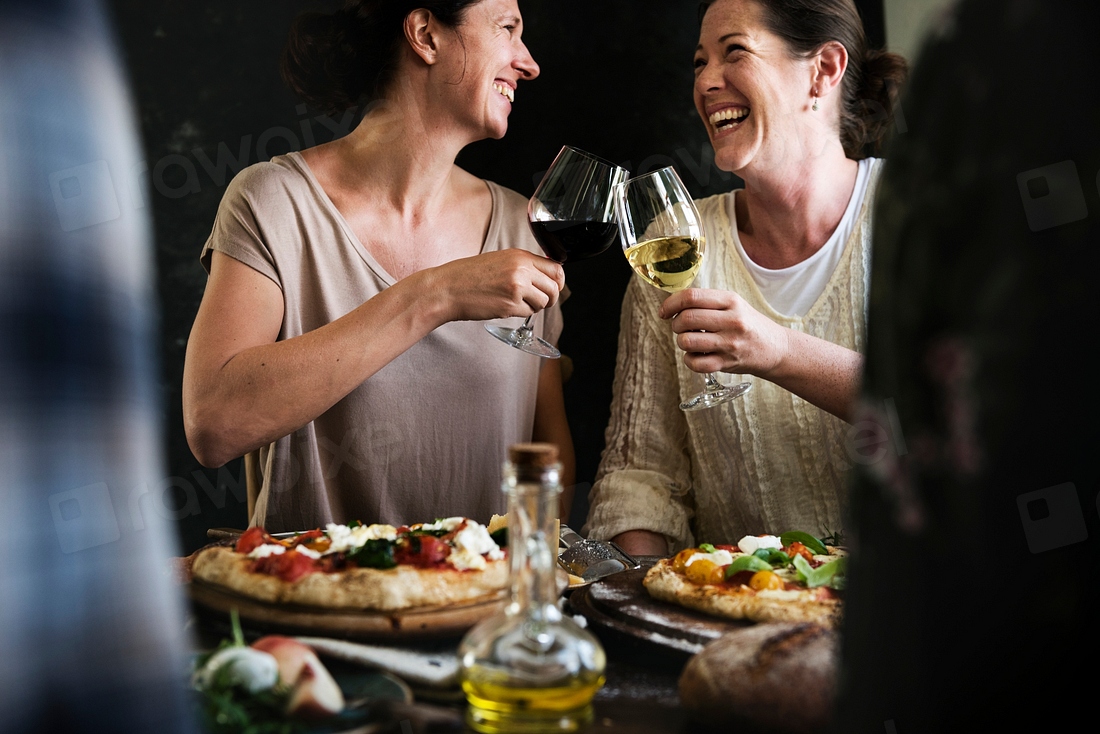 Happy women cheering glasses wine | Premium Photo - rawpixel