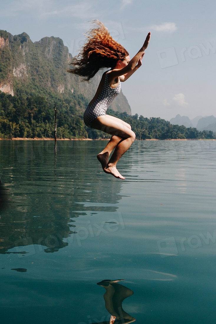Woman jumping into the water | Premium Photo - rawpixel