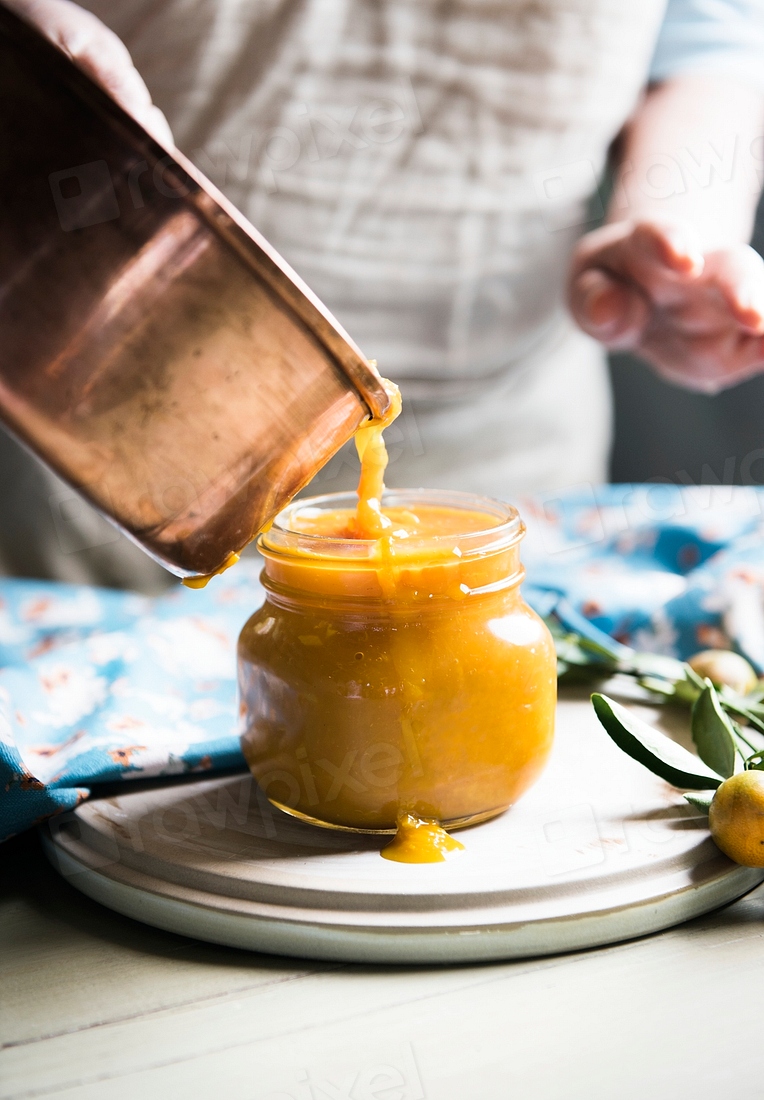 Hand pouring jam jar | Premium Photo - rawpixel