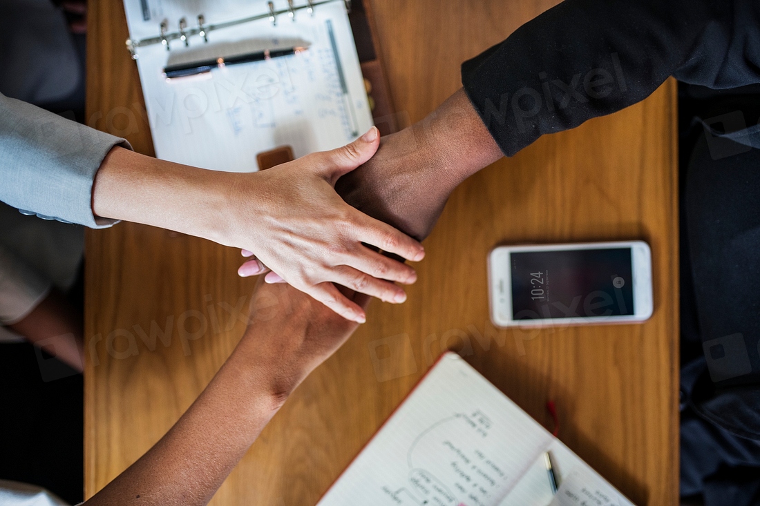 Diverse business team stacking hands | Free Photo - rawpixel