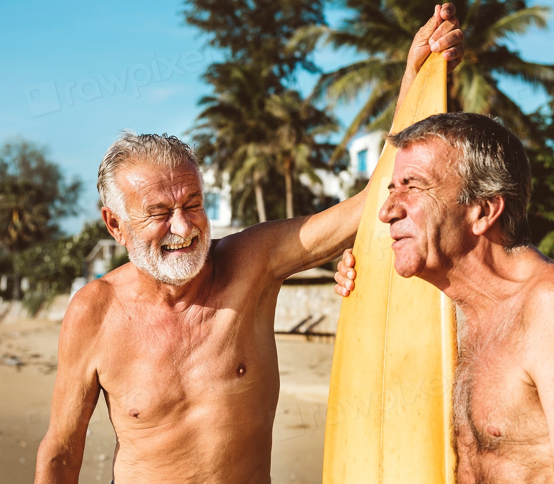 Mature surfers at the beach | Premium Photo - rawpixel