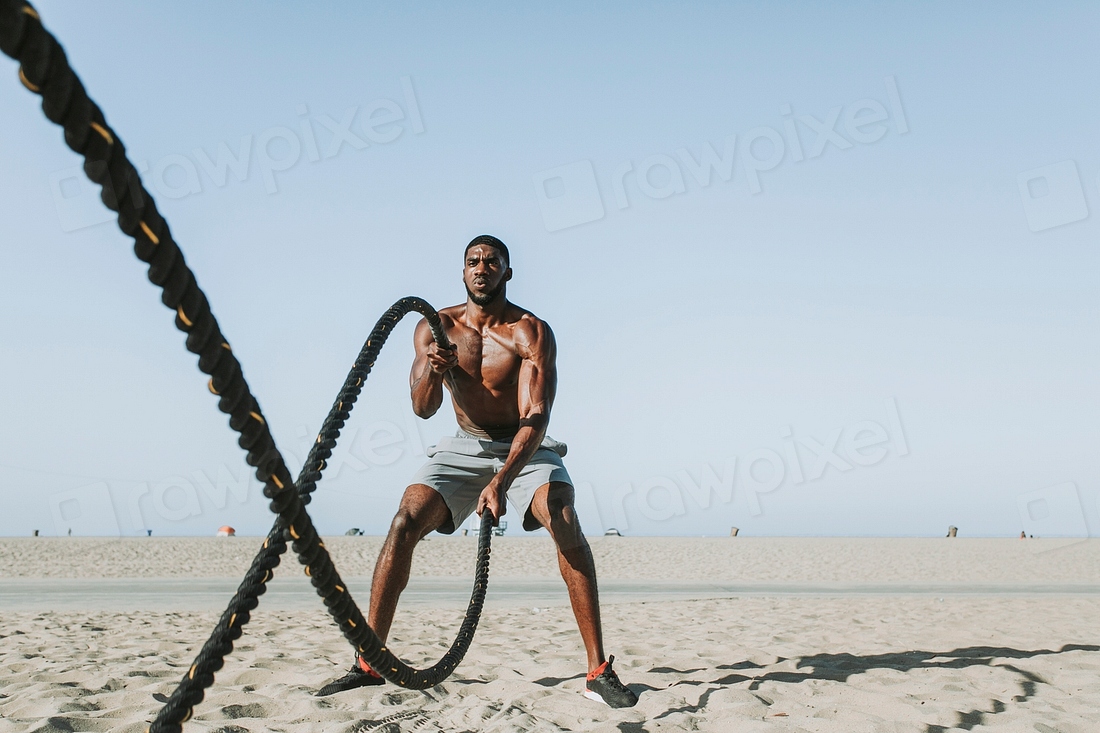 Fit man working battle ropes | Premium Photo - rawpixel