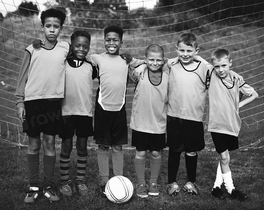 Junior football team standing together | Free Photo - rawpixel
