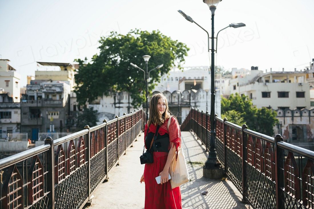 Western woman bridge city Udaipur, | Free Photo - rawpixel