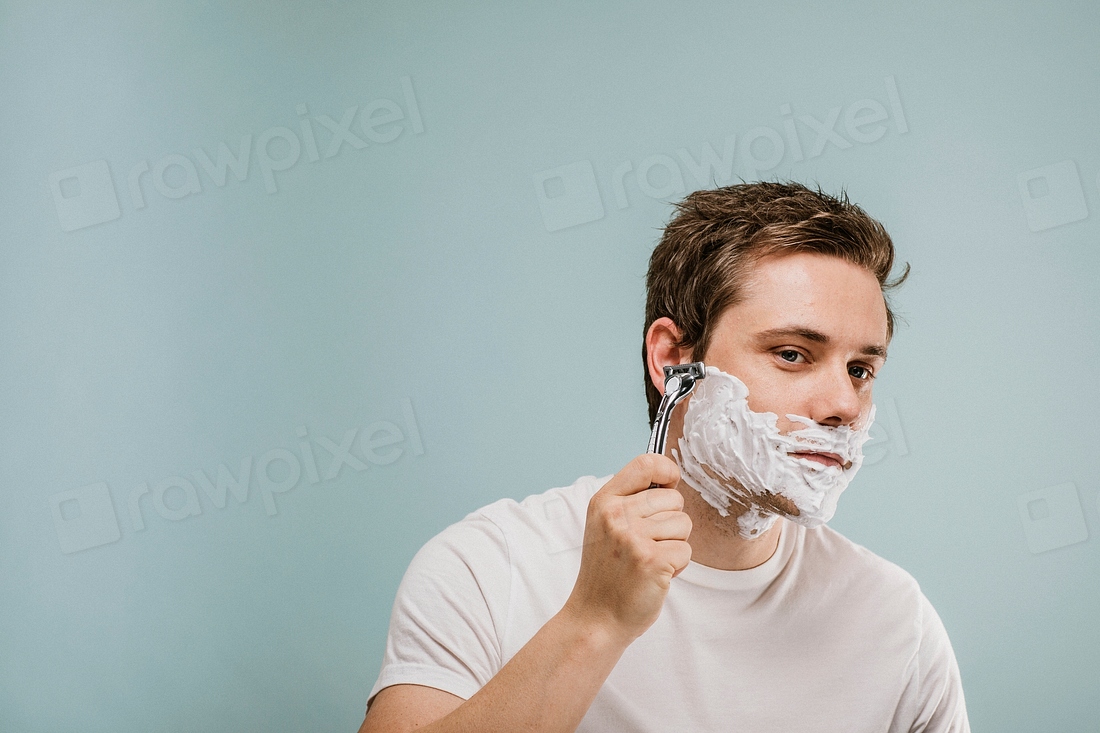 Young man shaving his beard | Premium Photo - rawpixel