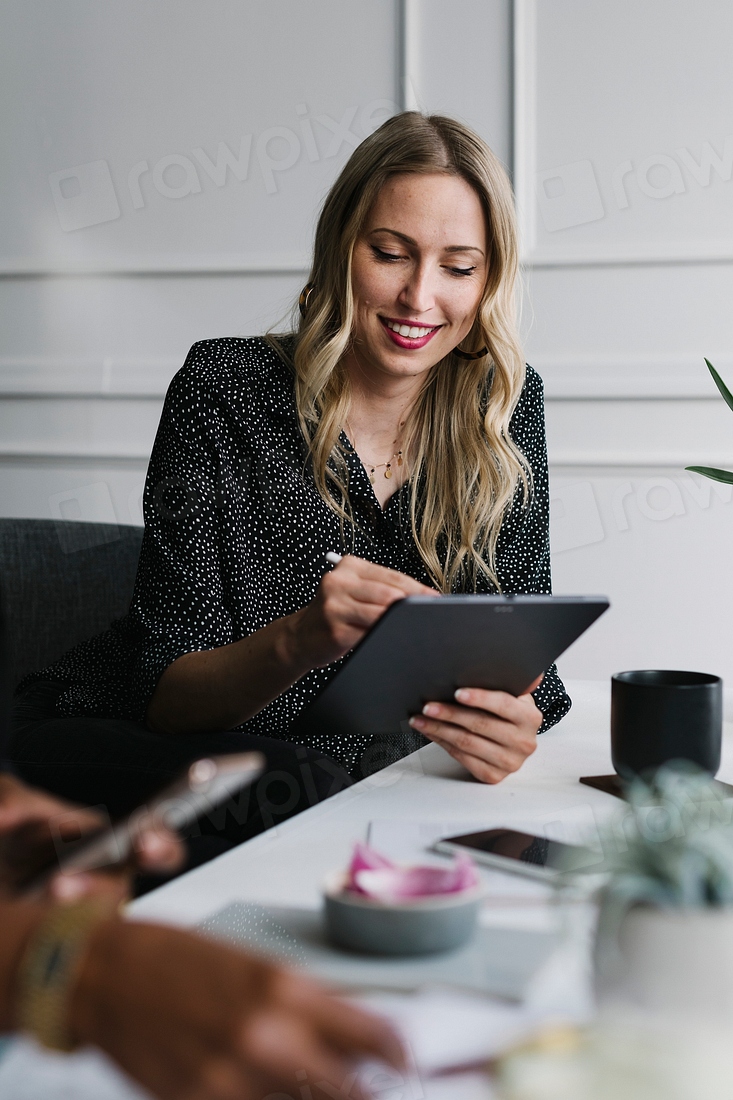 Happy businesswoman using digital tablet | Premium Photo - rawpixel
