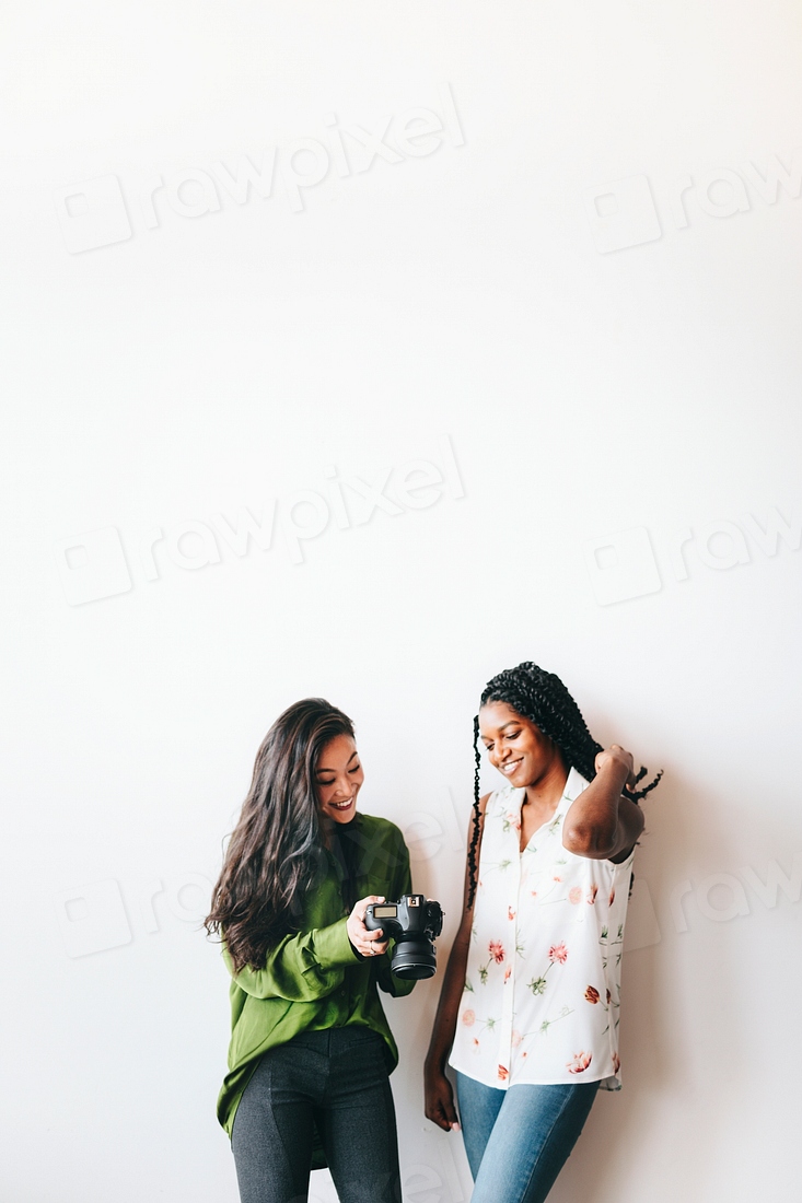 Happy women digital camera talking | Premium Photo - rawpixel
