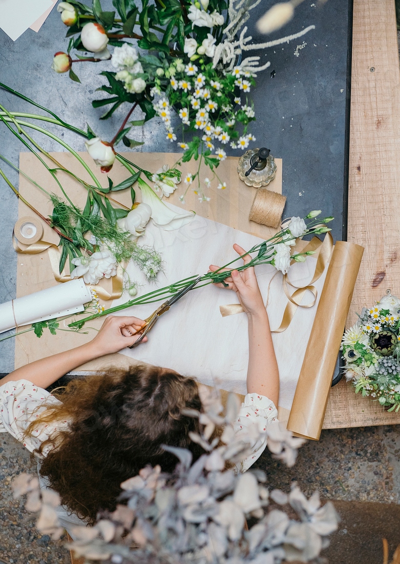 Woman making a flower bouquet | Premium Photo - rawpixel