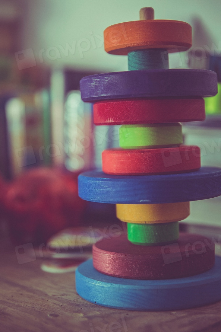 Colorful wooden stacking rings | Free Photo - rawpixel