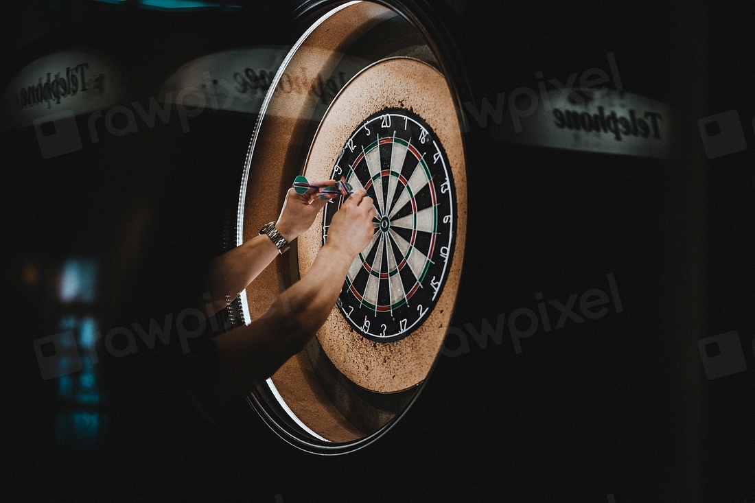 Man playing darts pub | Free Photo - rawpixel