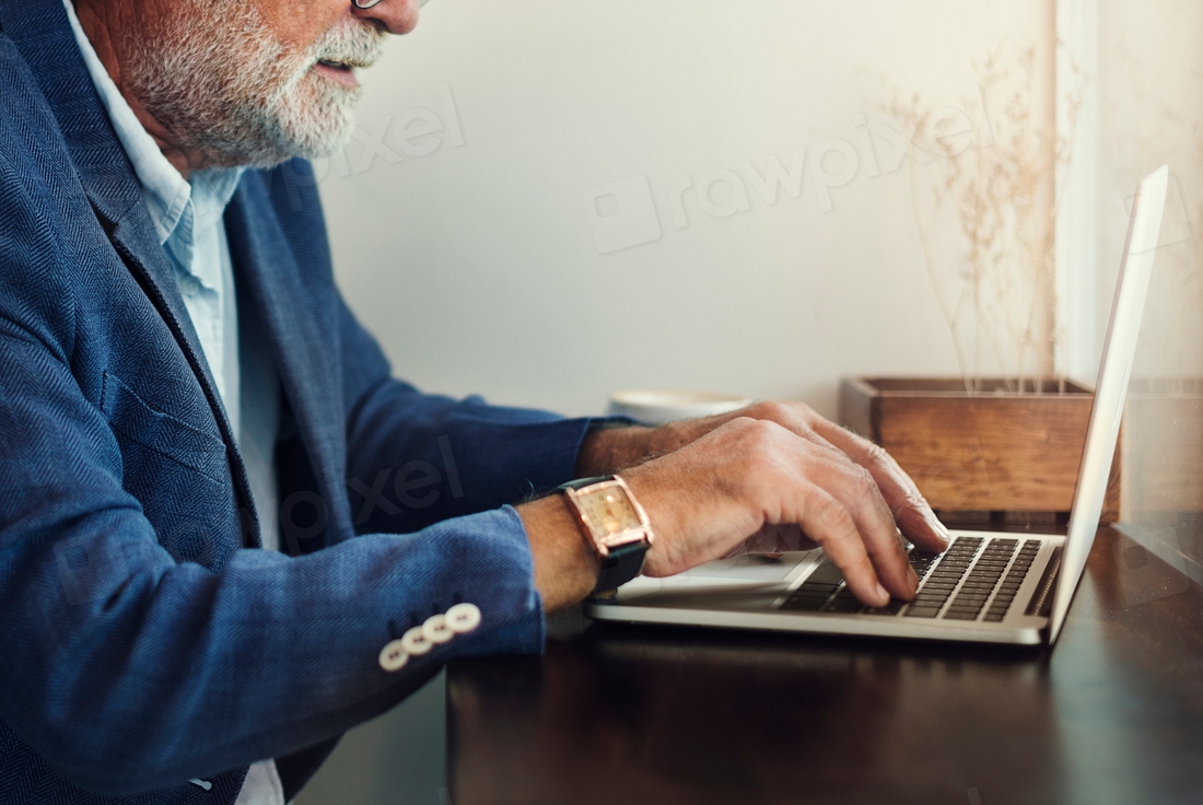 Elderly man is using computer | Premium Photo - rawpixel