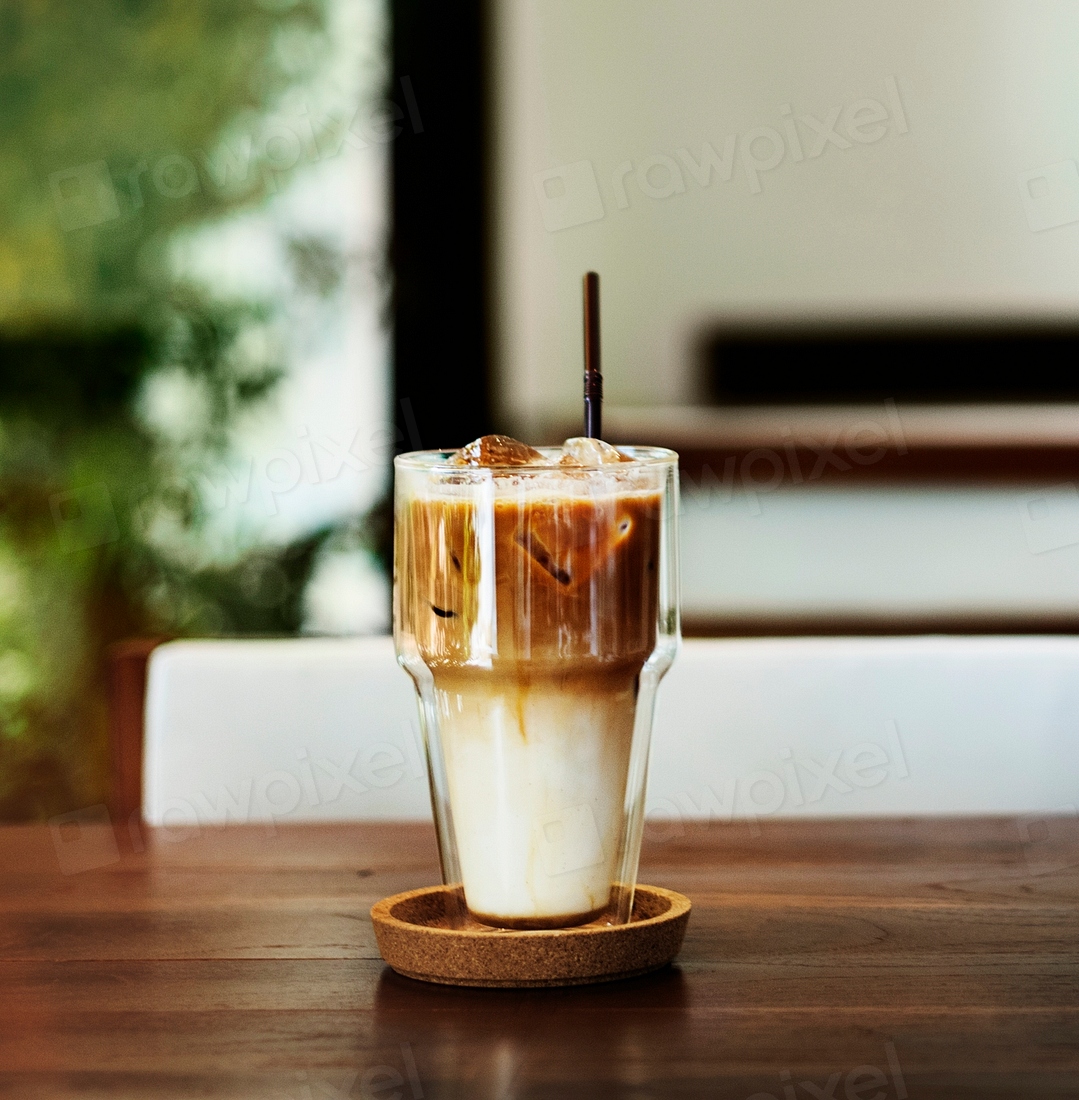 Closeup cold coffee wooden table | Premium Photo - rawpixel