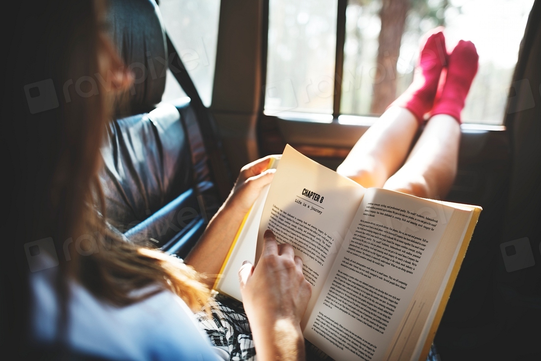 Girl reading a book in a car | Premium Photo - rawpixel